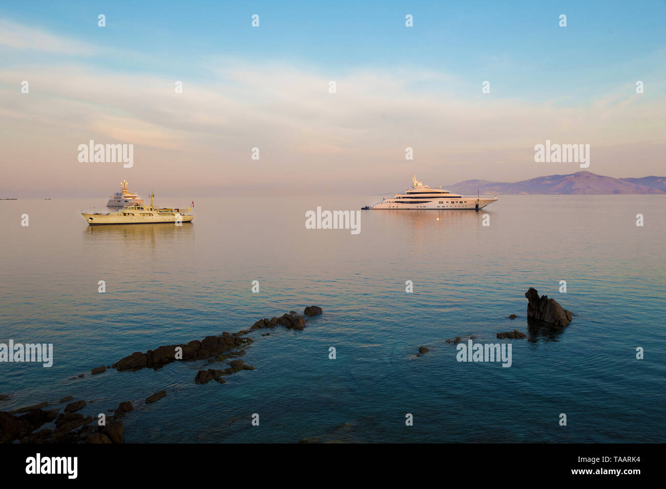 Morning on island Mykonosю yachts stand near the famous island of ...