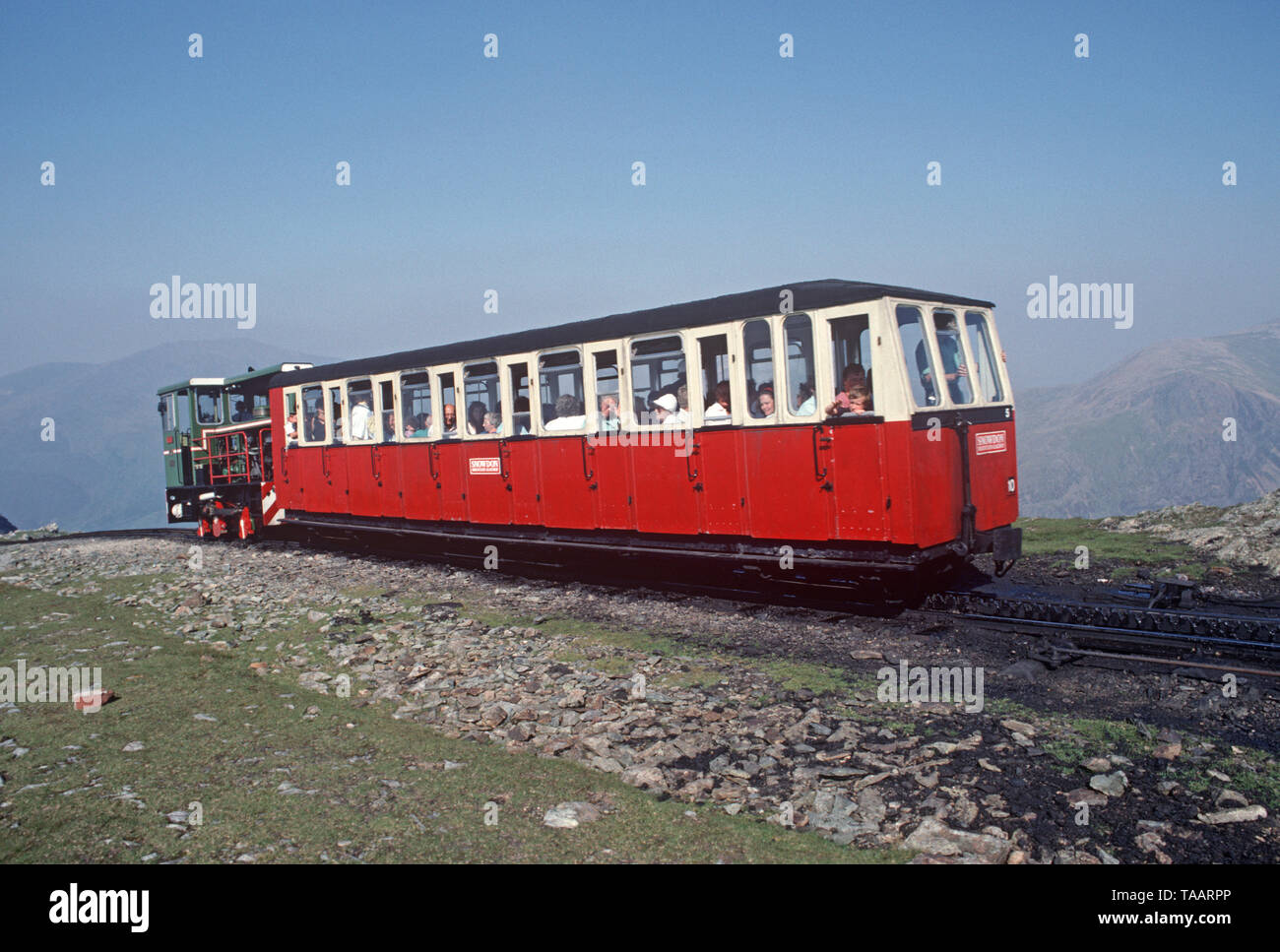 Snowdon Mountain Railway rack and pinion diesel locomotive reaching Mount Snowdon summit ...