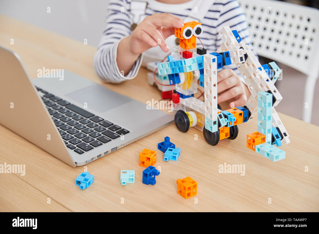 Japanese kid practicing programming Stock Photo - Alamy