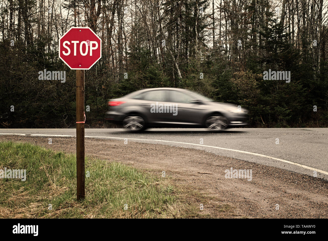 Stop sign and blurred car. Danger of accident concept Stock Photo - Alamy