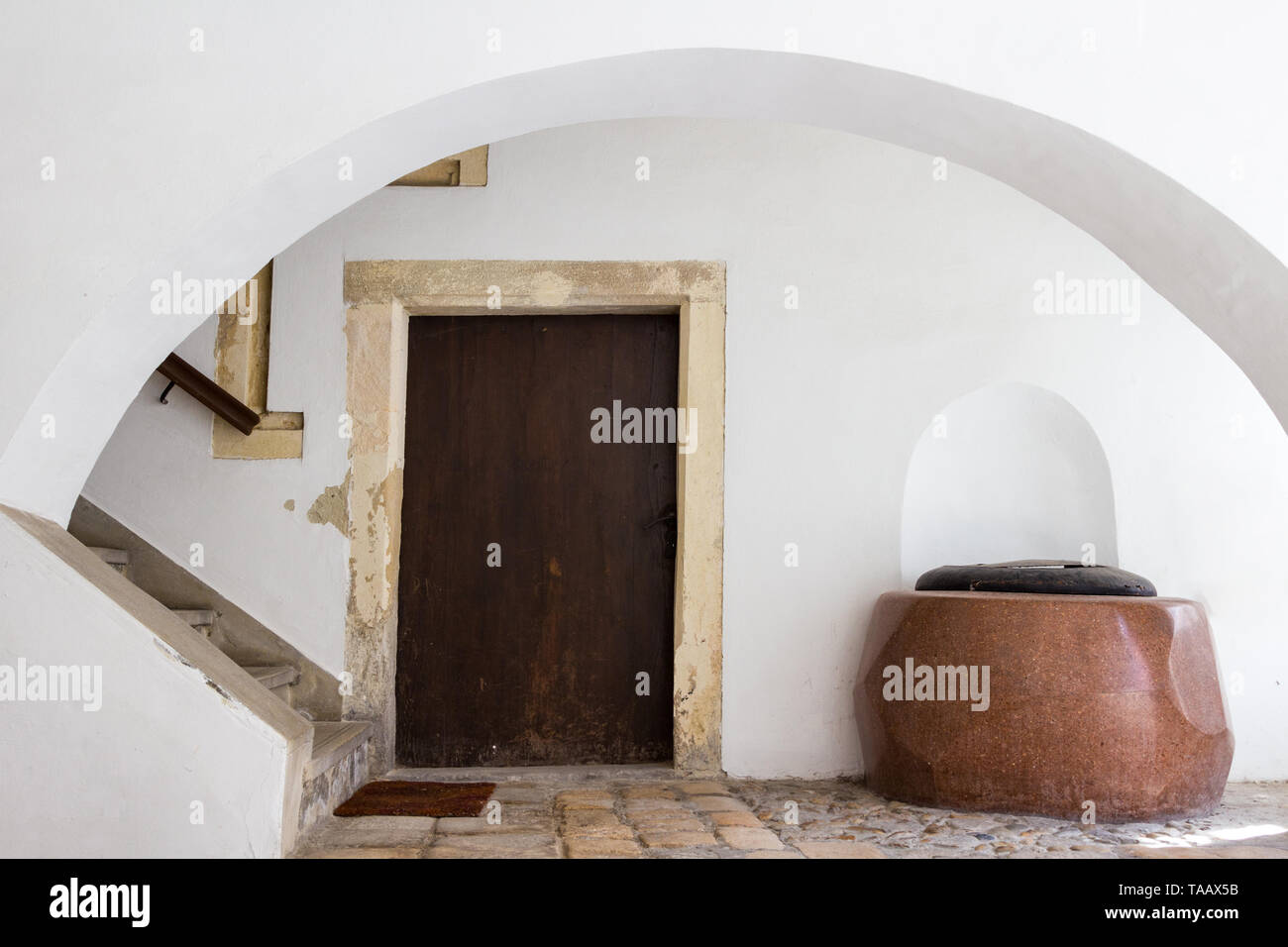 Medieval gateway with stairs, door and well, Uj utca, Sopron, Hungary ...