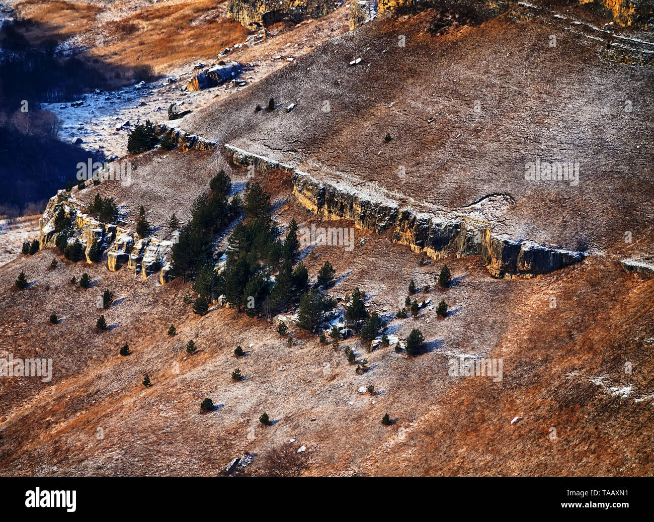 Foothills of the Caucasus. Huge ravines, cliff edge with rocky walls of ...