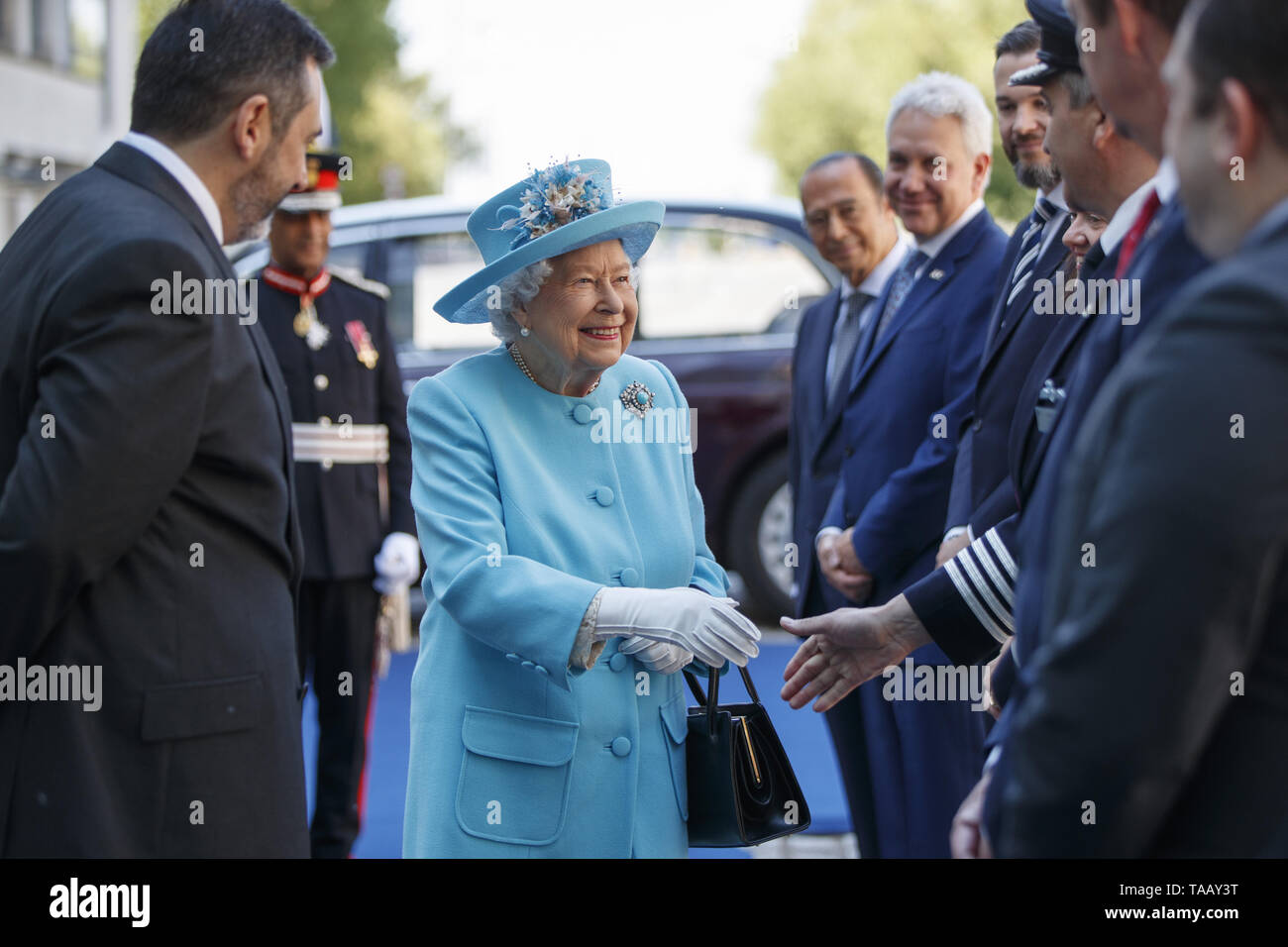 Queen Elizabeth II is accompanied by Chief Executive of British Airways ...
