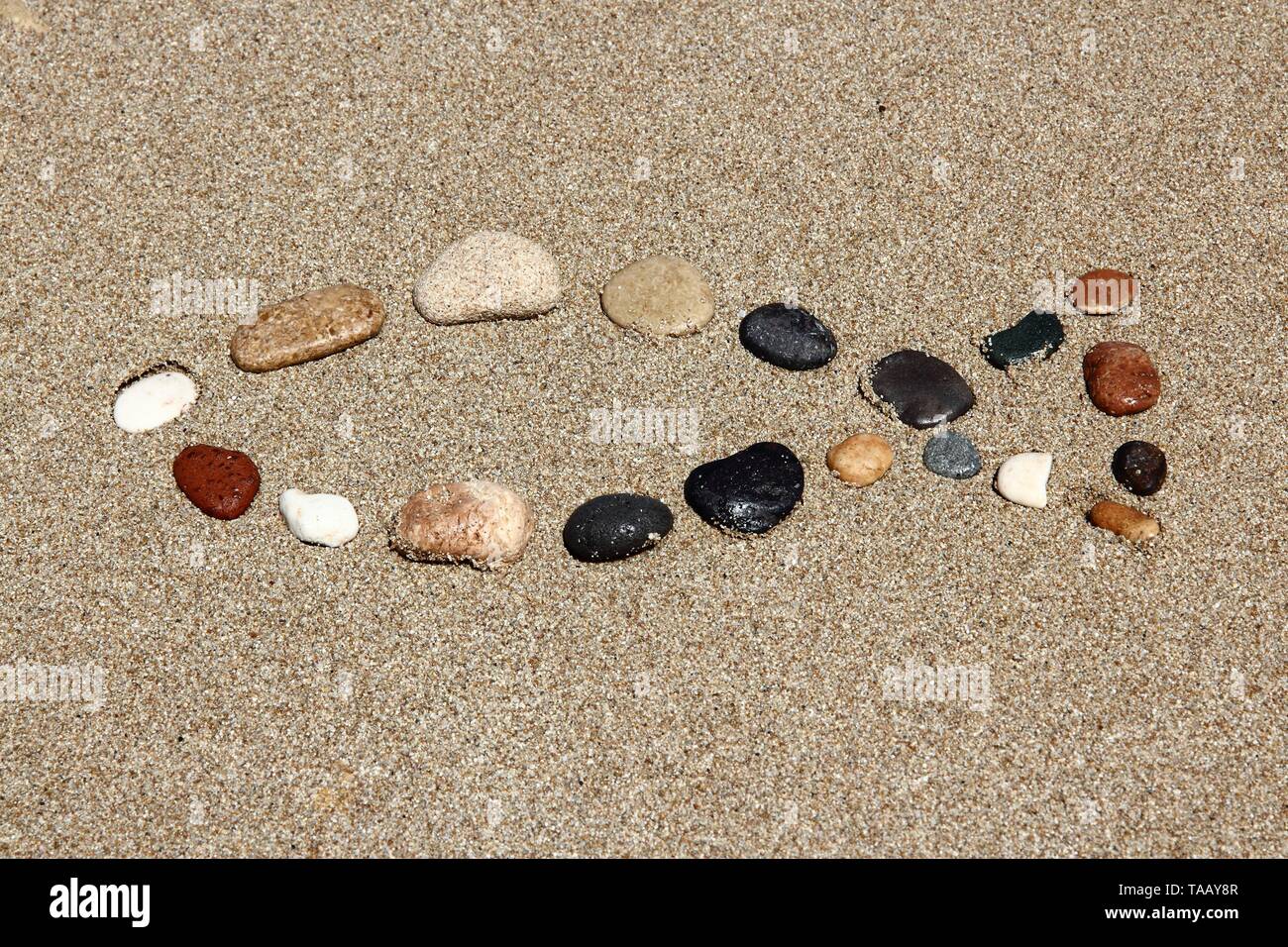 Christianity symbol - fish shape made of pebbles. Catholicism fish ...