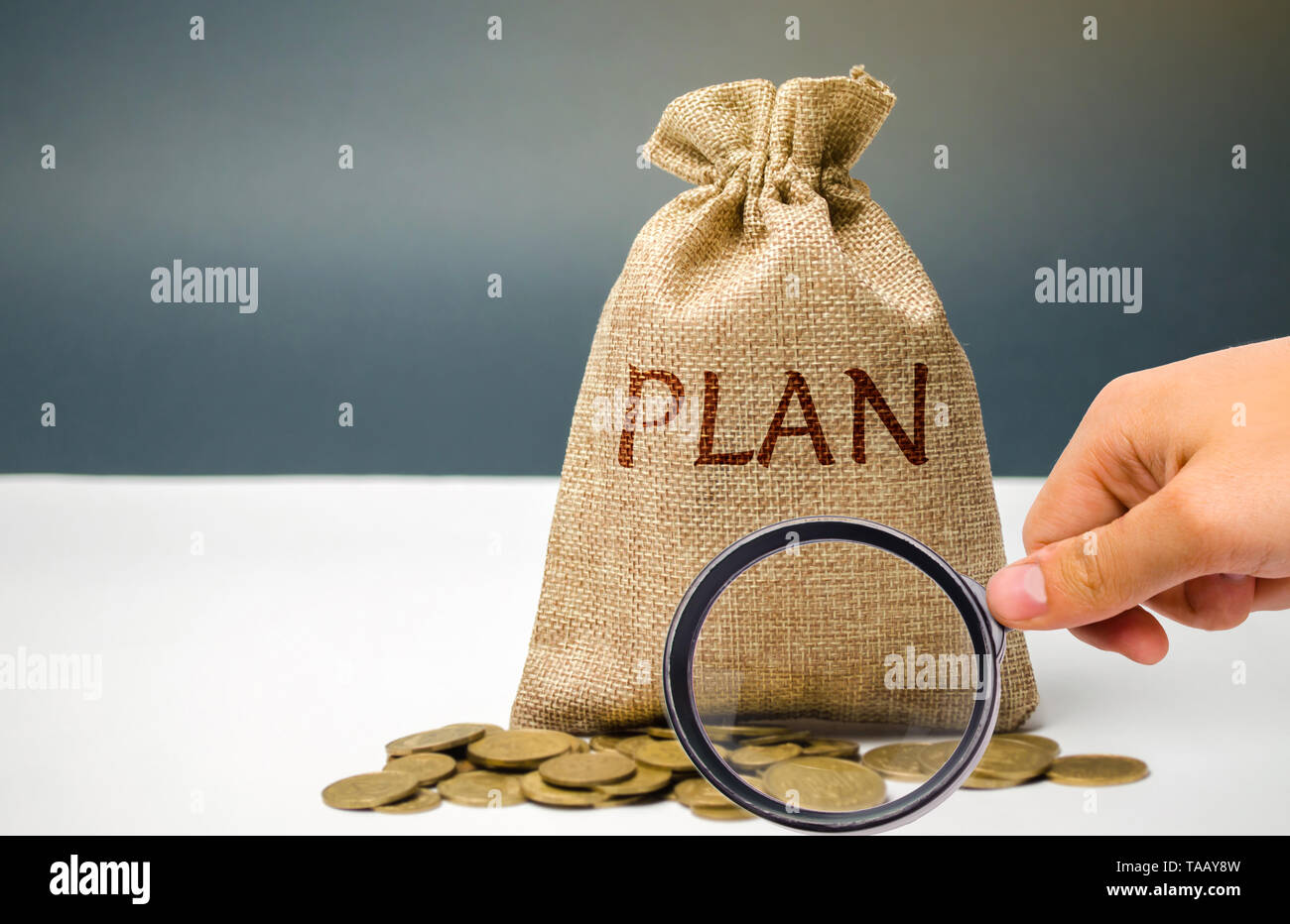 Money bag with coins and the word Plan. Personal financial planning ...