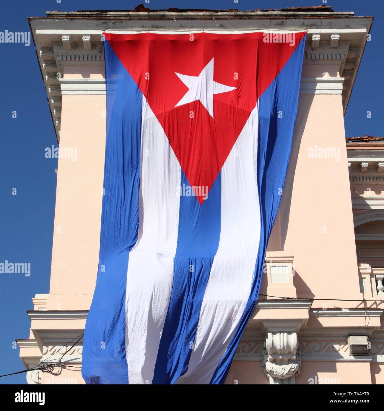 Flag of Cuba moving in the wind. National symbol on a building in ...