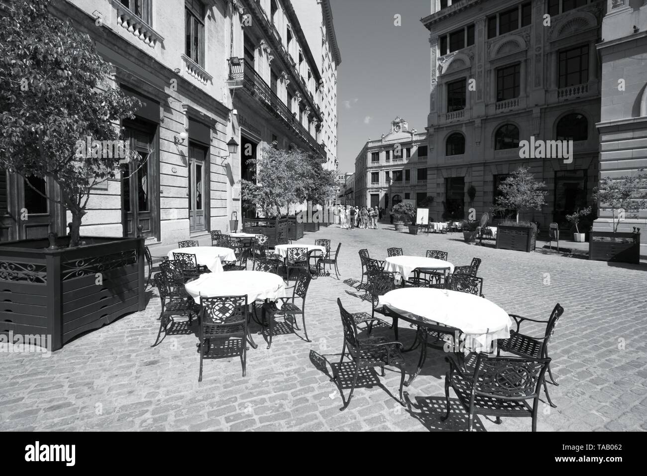 Havana, Cuba - outdoor cafe in the Old Town (Habana Vieja). Black and ...
