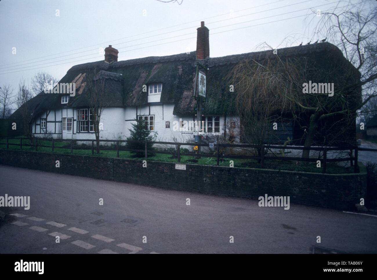 A pub with old thatch before renewal, UK Stock Photo - Alamy