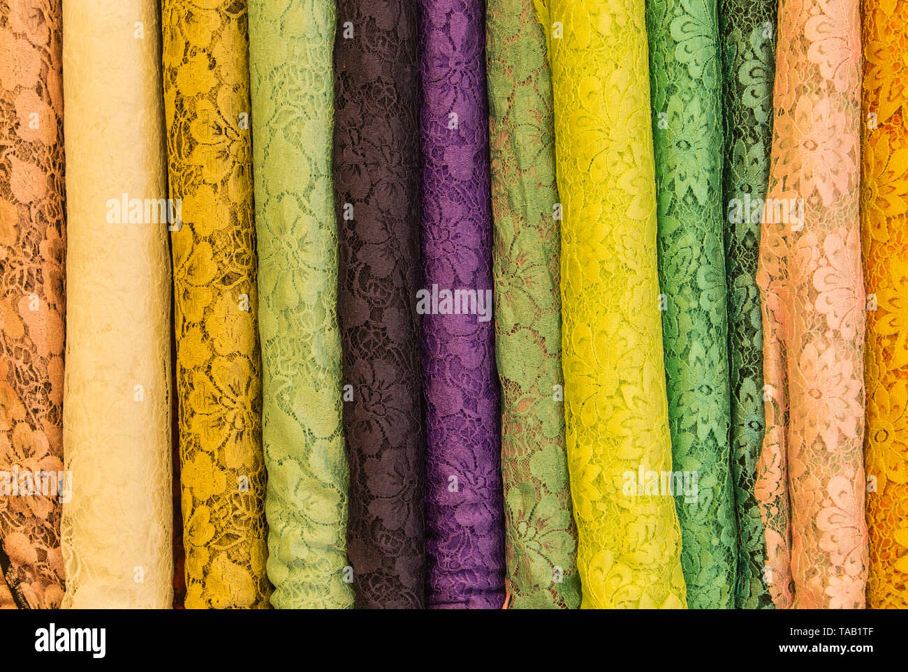 colorful pattern silk cloth display in shop Stock Photo - Alamy
