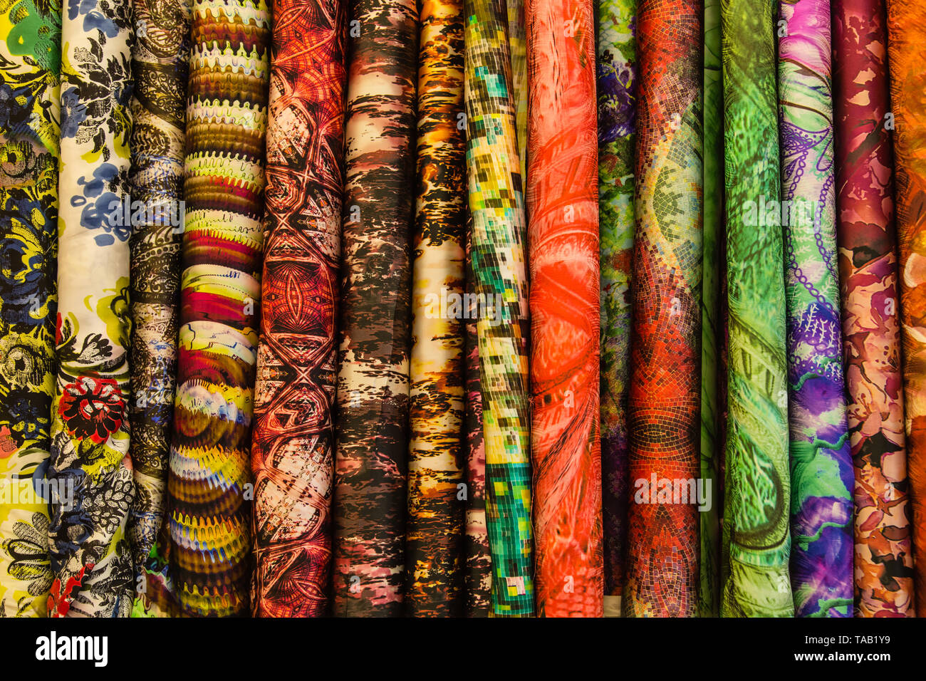 colorful pattern silk cloth display in shop Stock Photo - Alamy