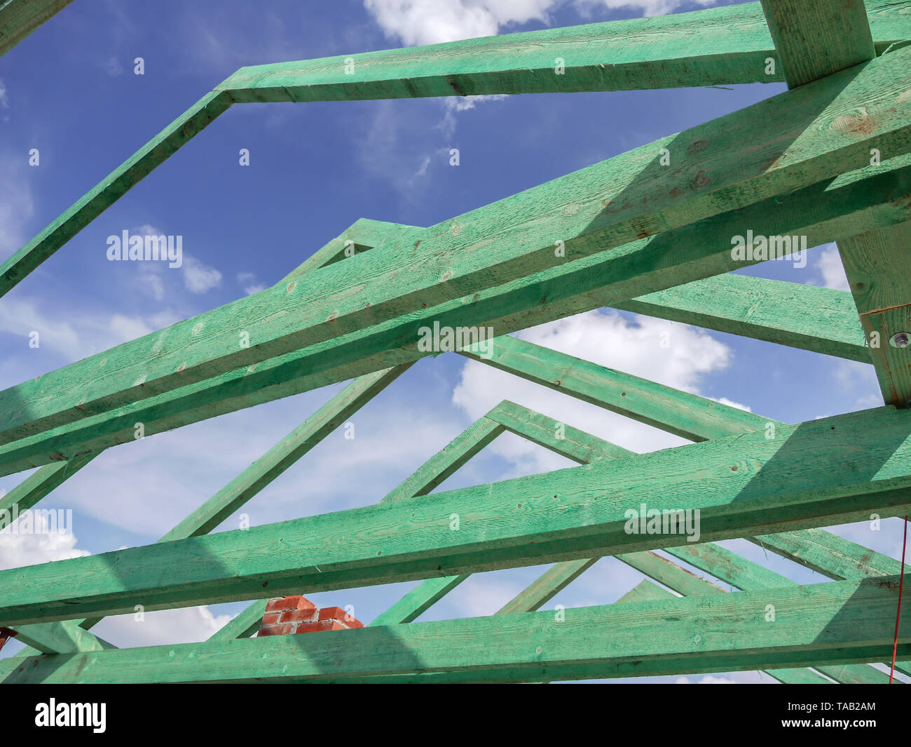 House rafter framing under construction Stock Photo - Alamy