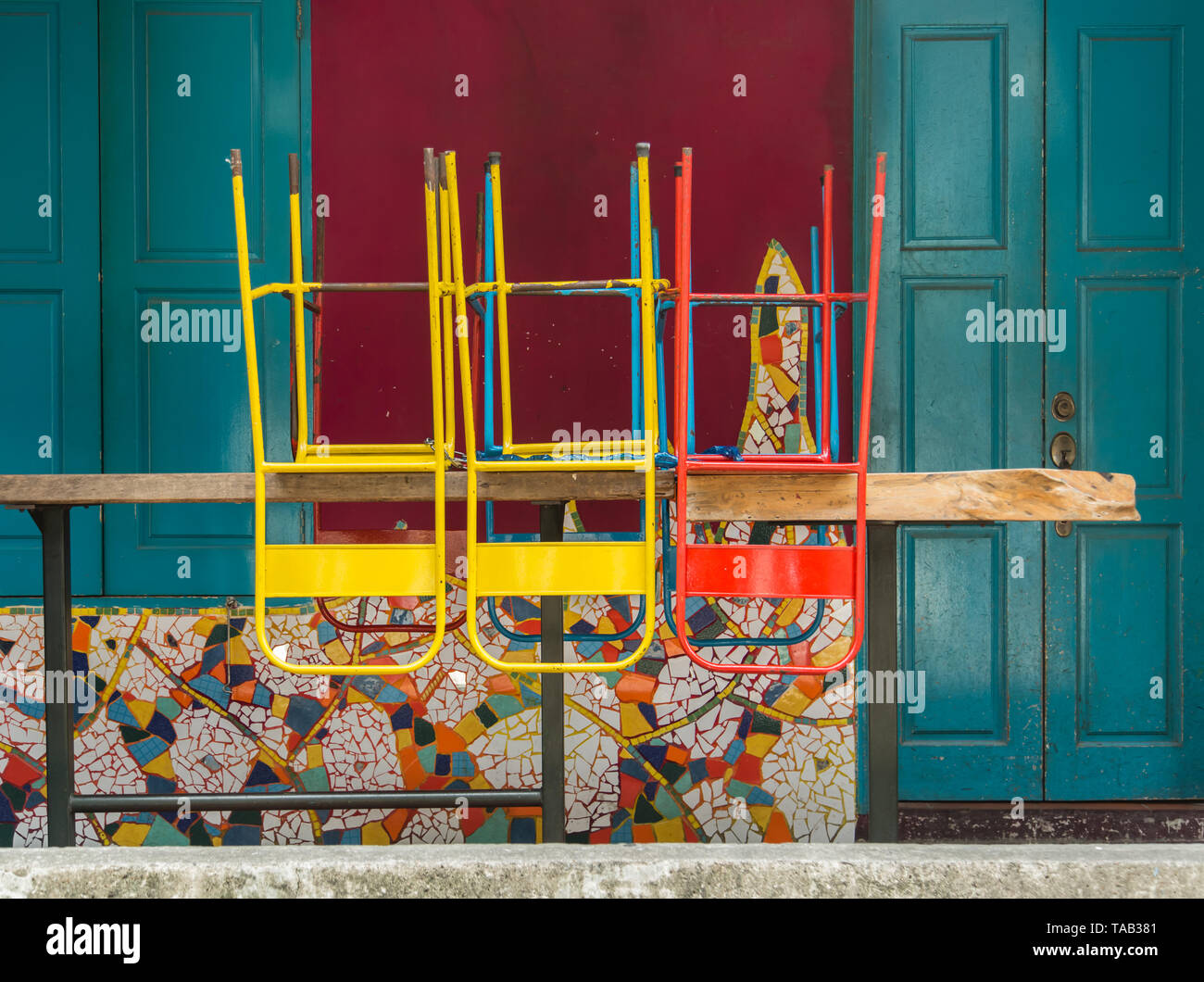 vintage colorful closed bar with colorful chair Stock Photo - Alamy