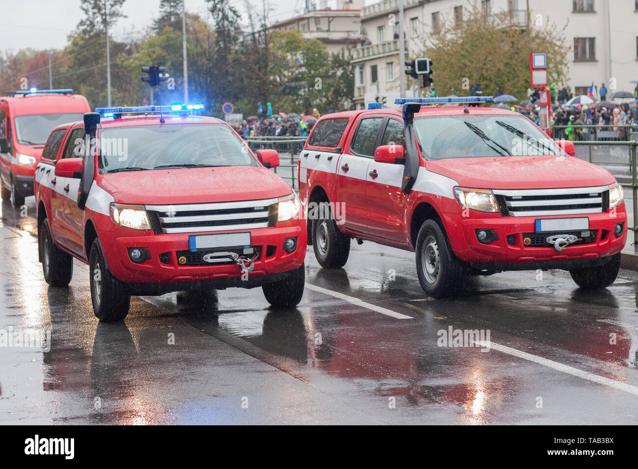 Fire brigade workers riding cars on military parade in Prague, Czech ...