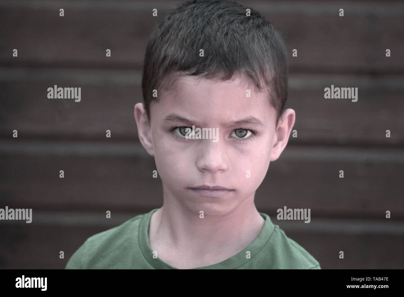 moody young boy Stock Photo - Alamy