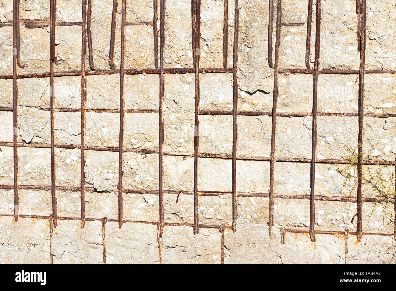 Old reinforced concrete structure with damaged and rusty metallic ...