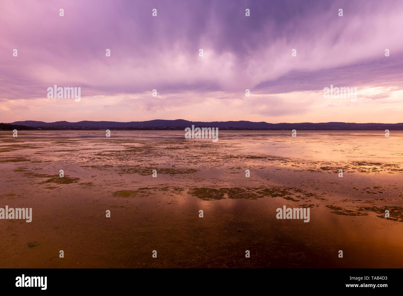 A large tidal lake at sunset Stock Photo - Alamy