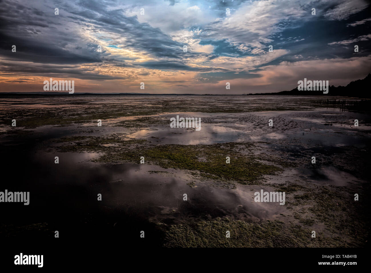 A large tidal lake at sunset Stock Photo - Alamy
