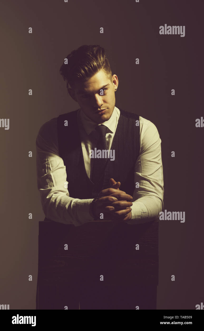 Handsome man or manager with stylish haircut Stock Photo - Alamy