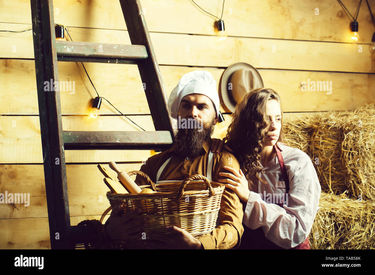 Chef cook and girl cookee Stock Photo - Alamy