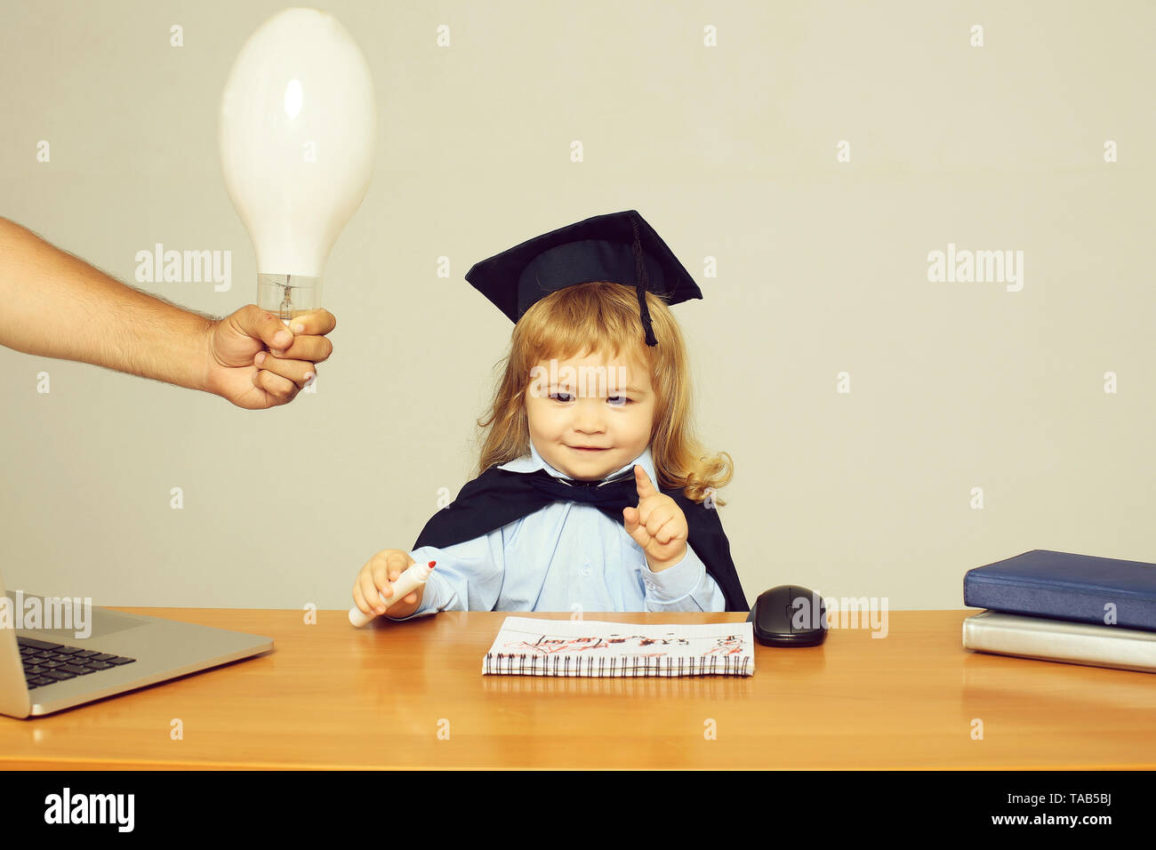 Little boy at school desk Stock Photo - Alamy