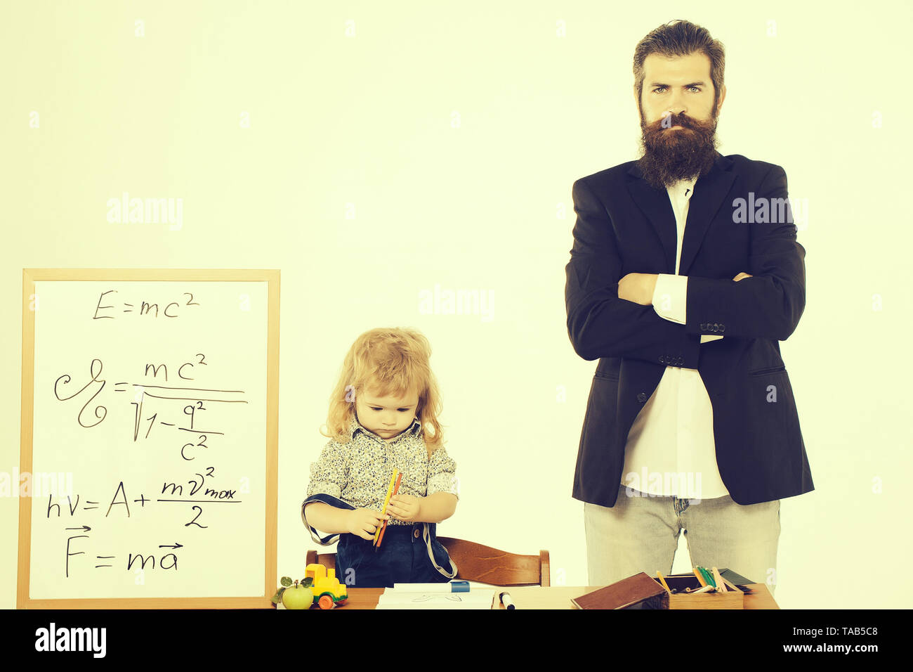 Cute child boy with professor Stock Photo - Alamy