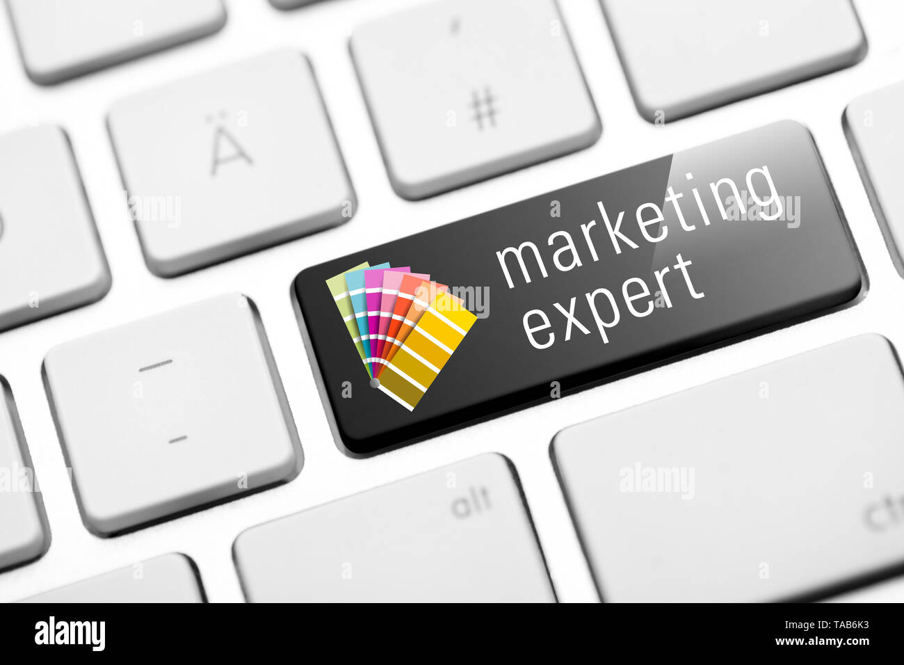 marketing expert key on keyboard Stock Photo - Alamy