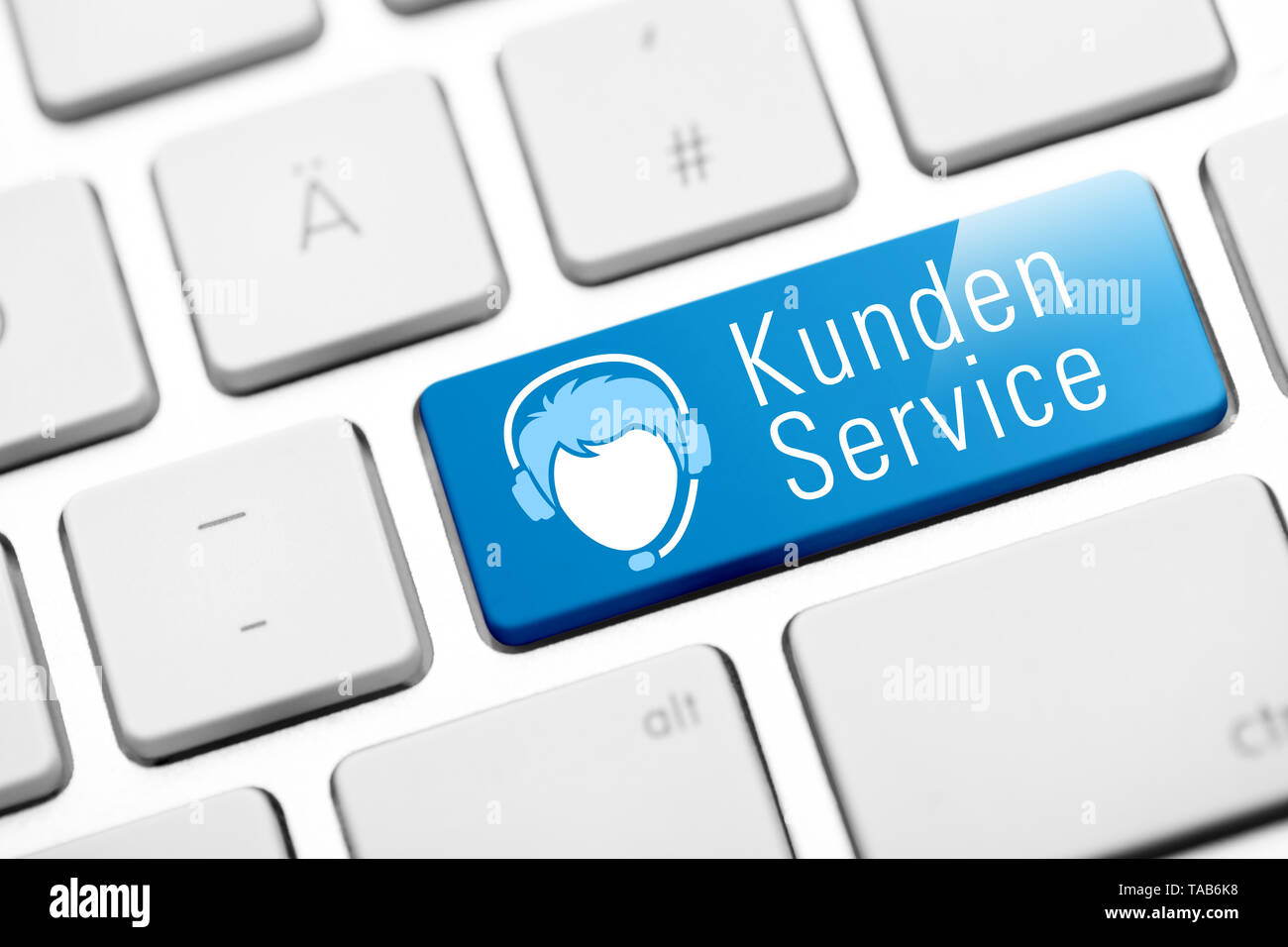 customer support key on white keyboard Stock Photo - Alamy
