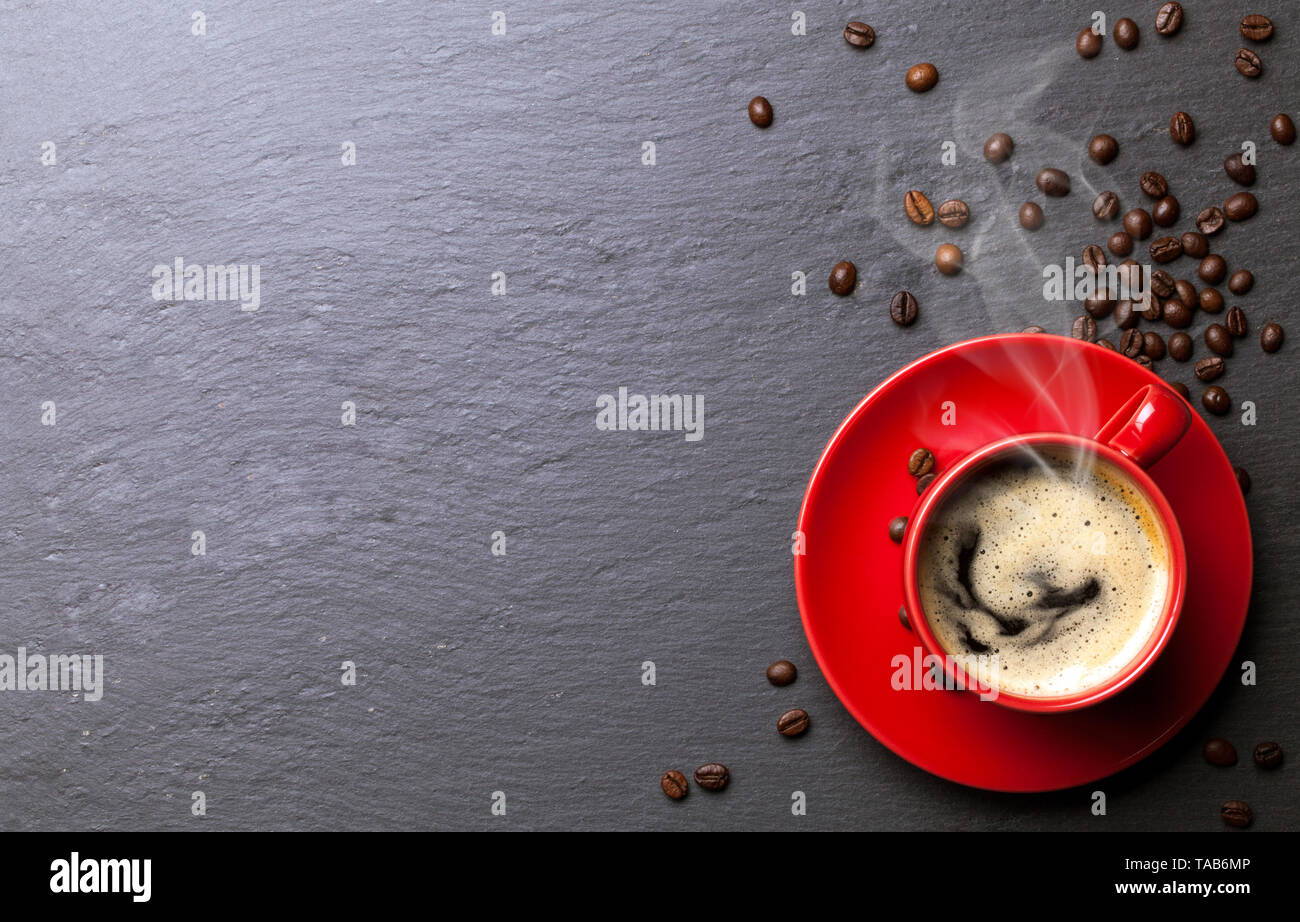 coffee cup background with coffee beans Stock Photo - Alamy
