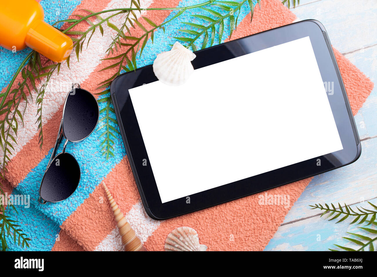 summer beach background with a blank tablet Stock Photo - Alamy