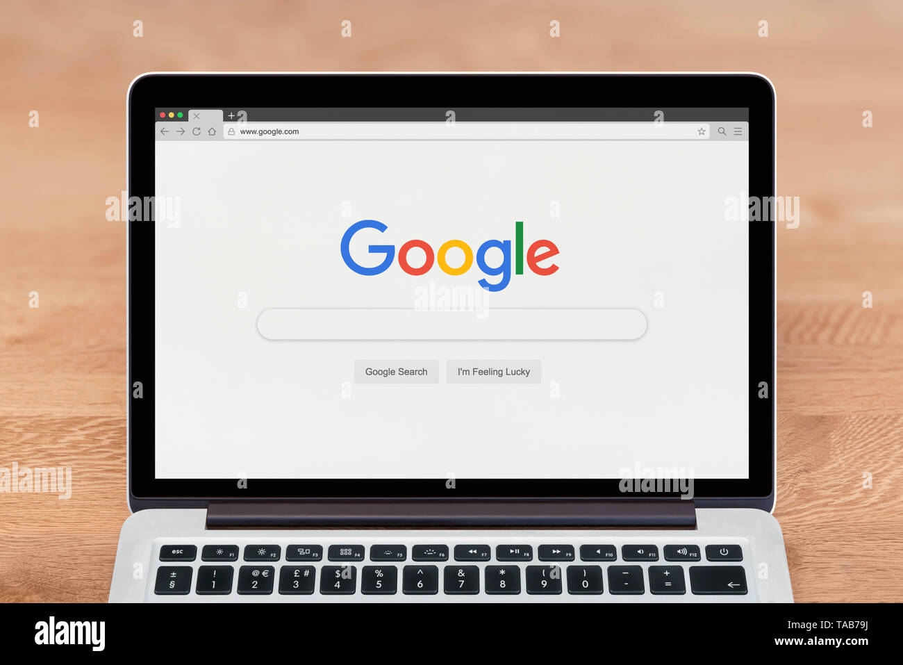 An Apple Macbook displays the Google website (Editorial use only Stock ...