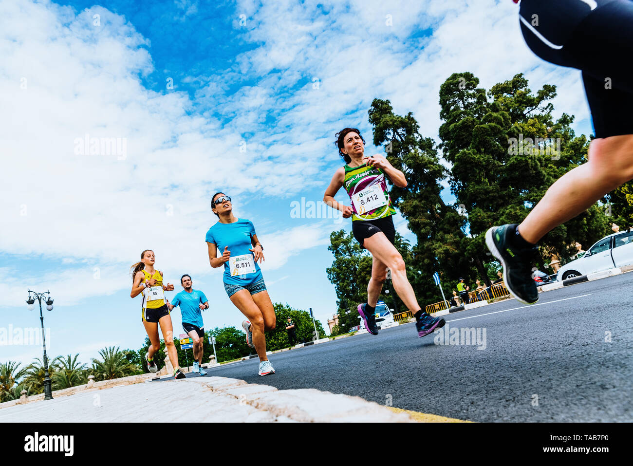 Female run finish line white background hi-res stock photography and ...