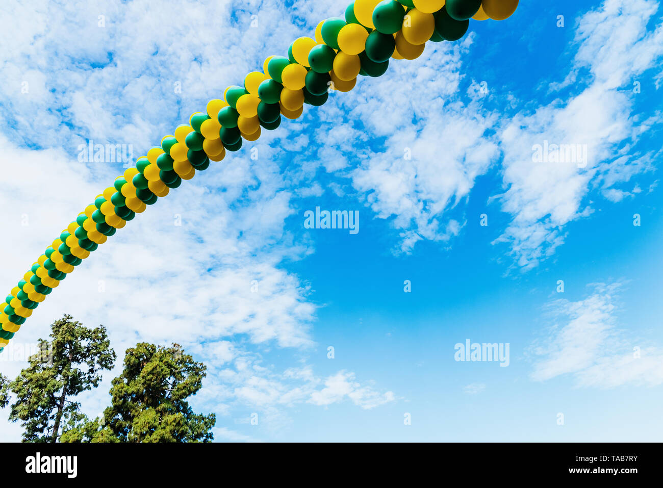 Scene with chain of Floating Balloon Cloud in air with white clouds sky ...