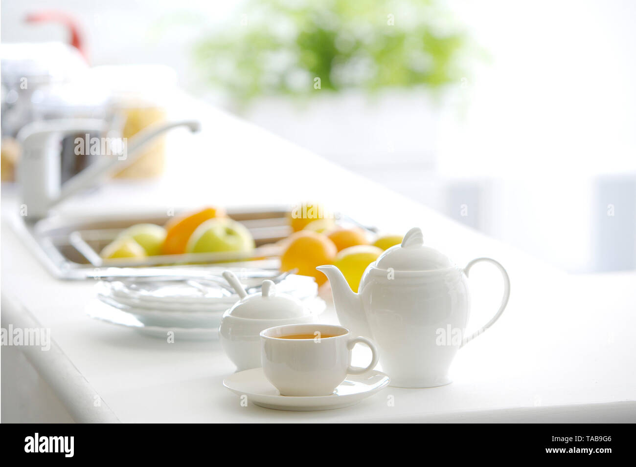 dishes on the table with a cup Stock Photo - Alamy