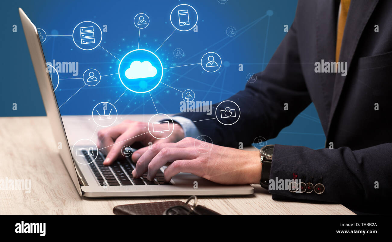 Businessman hand typing with cloud technology system and office symbol ...