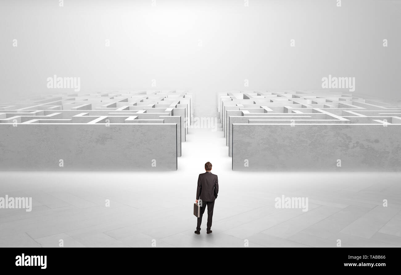 Businessman going straight ahead on a red carpet arrow between two maze ... Businessman going straight ahead on a red carpet arrow between two maze ...