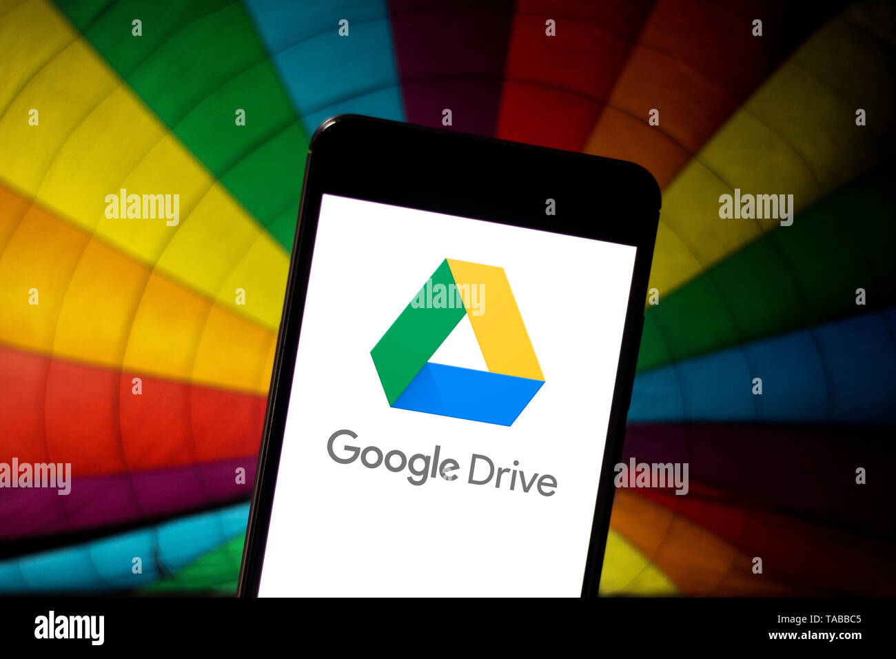 In this photo illustration the Google Drive logo is seen displayed on a ...