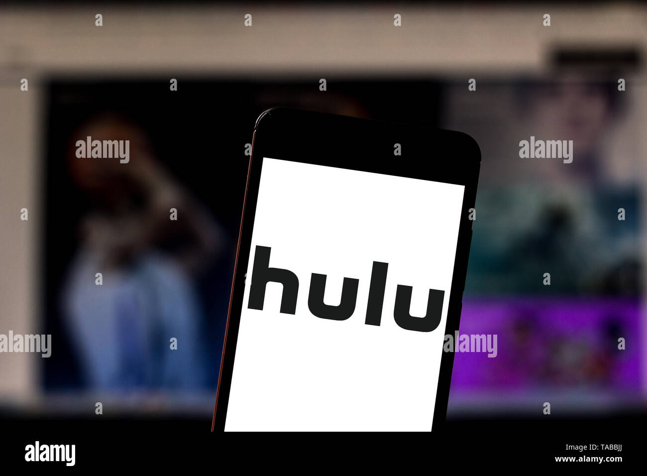 In this photo illustration the Hulu logo is seen displayed on a ...