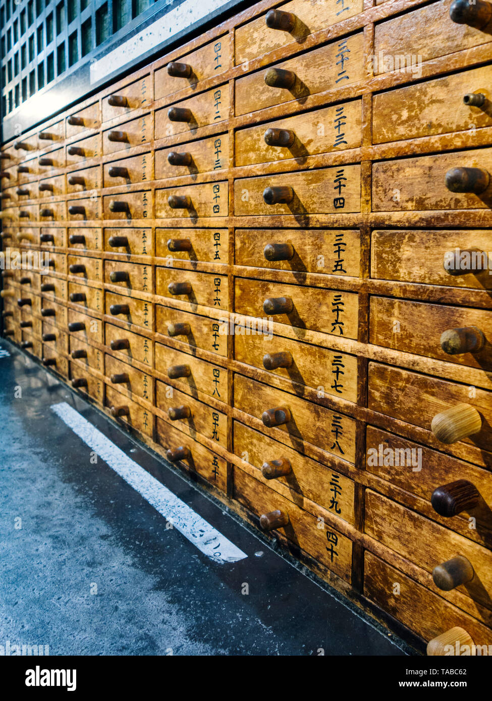 Drawers containing fortune sticks at Sensoji Temple in Tokyo’s Asakusa ...