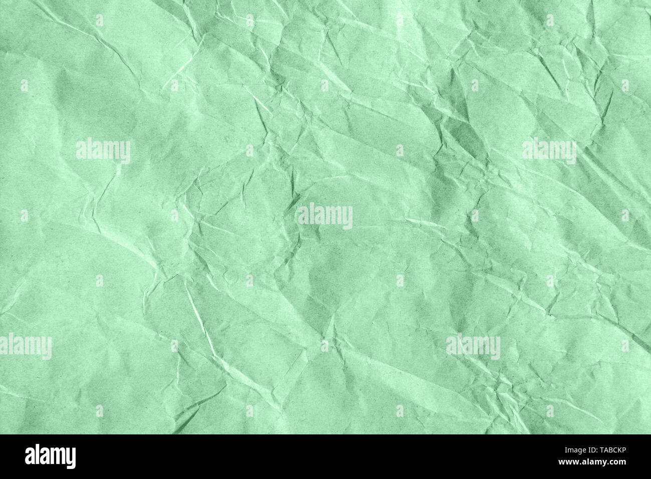 Trendy neo mint colored textured background. Crumpled craft paper. Flat ...