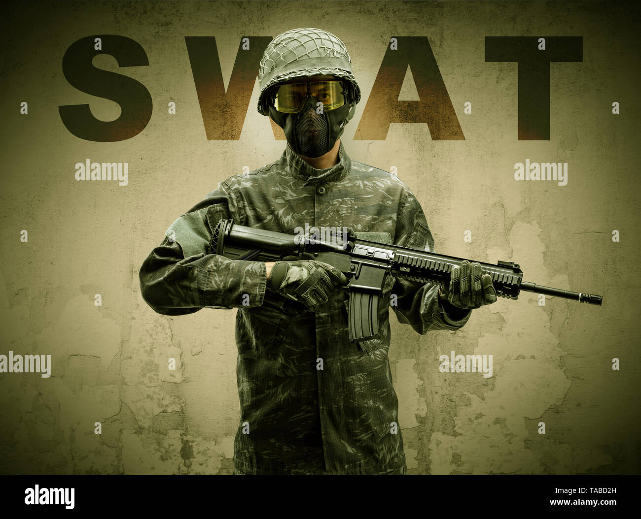 Uniformed armed soldier with damaged wall background Stock Photo - Alamy