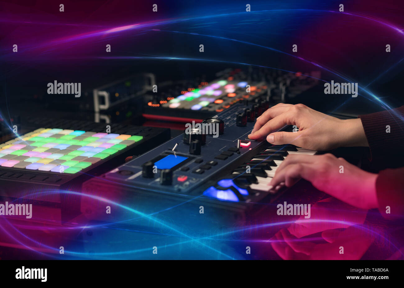 Hand mixing music on midi controller with wave vibe concept Stock Photo ...