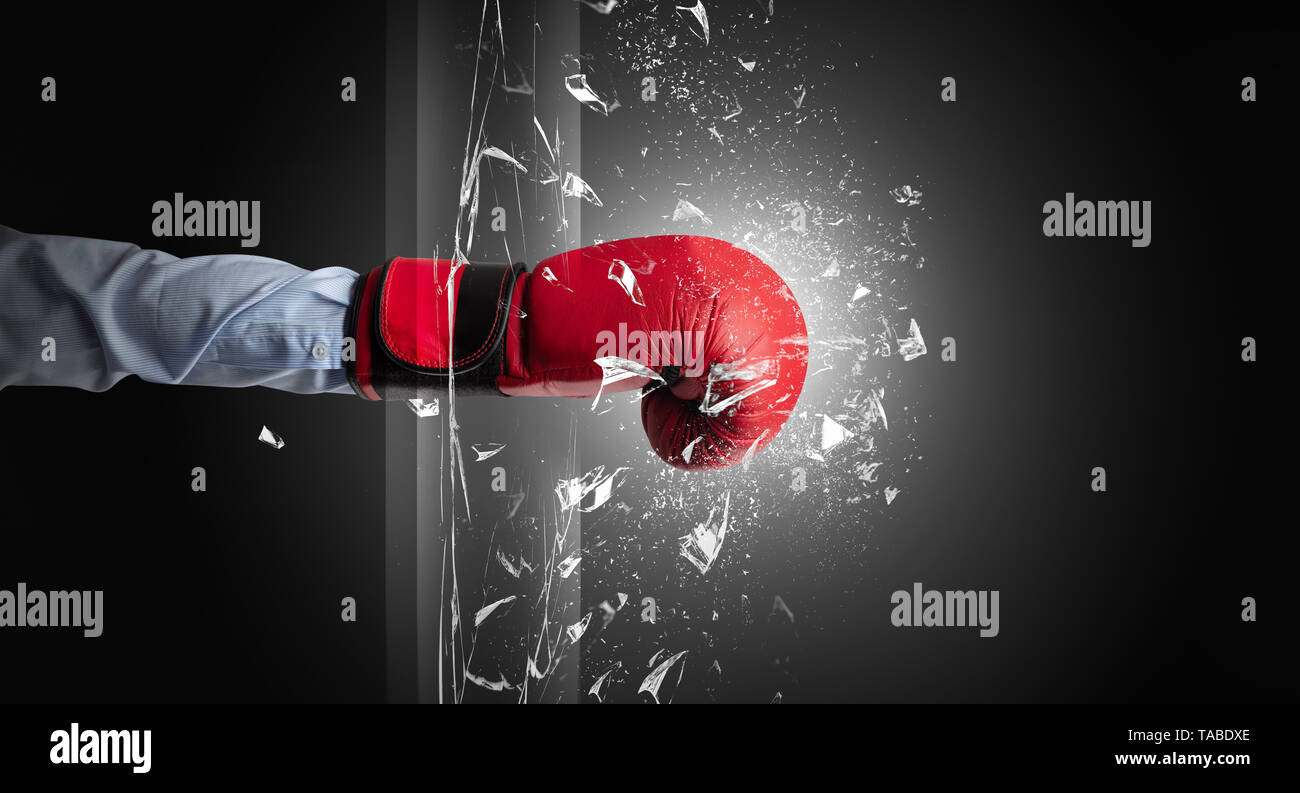 Big hand hits intense and breaks glasses Stock Photo - Alamy
