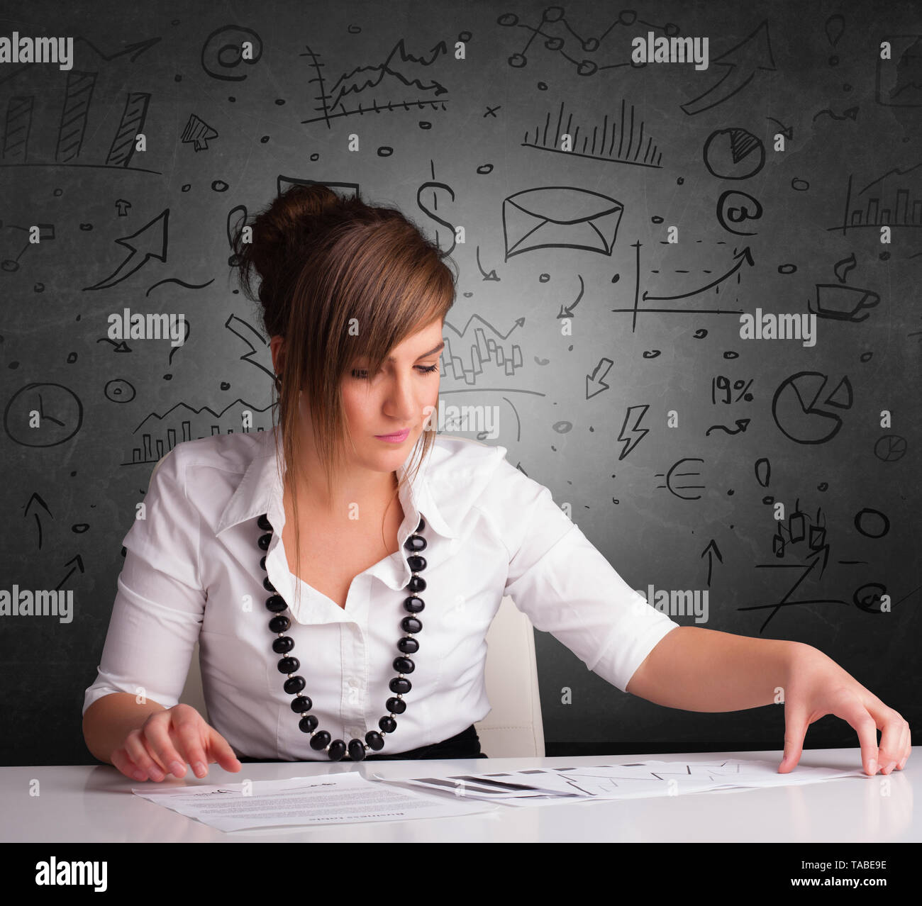Young secretary with doodle multitask concept Stock Photo - Alamy