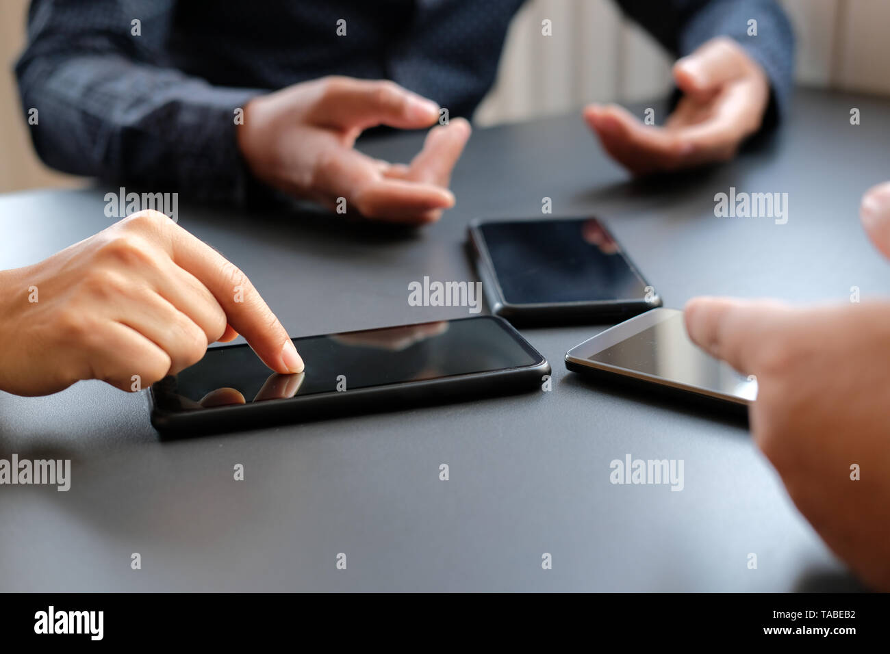 business people discussing using smart mobile phone smartphone Stock ...