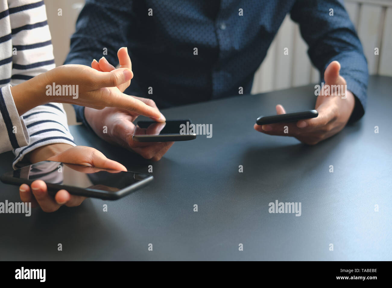 business people discussing using smart mobile phone smartphone Stock ...