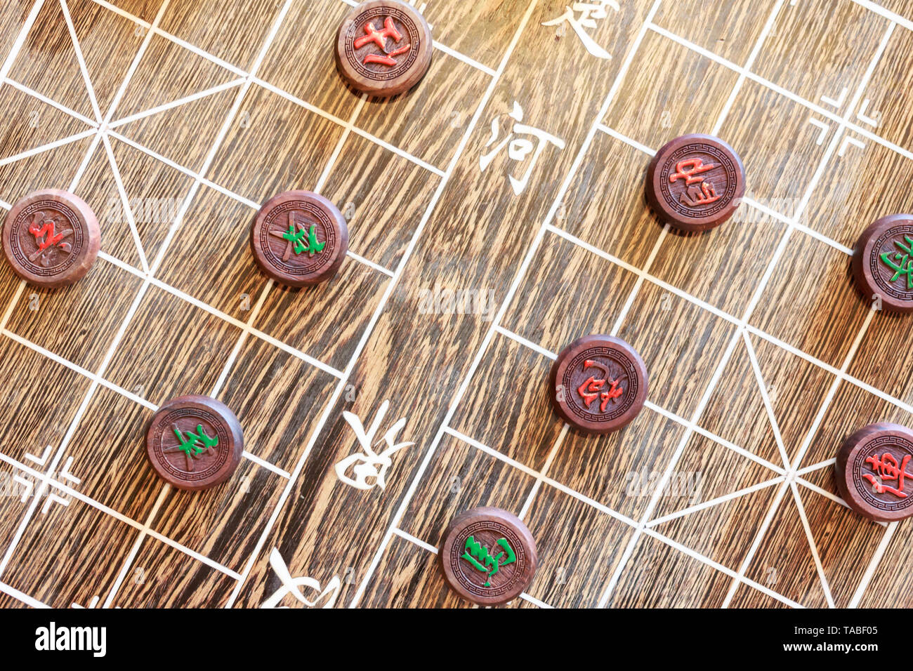 Wooden Chinese chess board and marker. The chinese character on marker ...