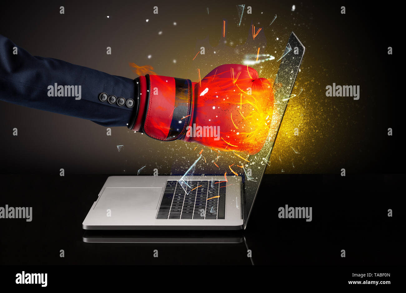Firing hand hitting strongly laptop screen glass Stock Photo - Alamy