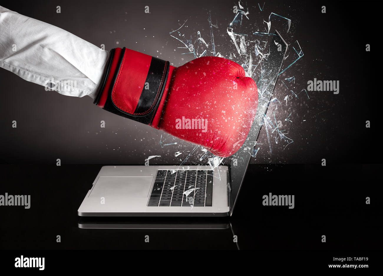 Hand hitting strongly laptop screen glass Stock Photo - Alamy