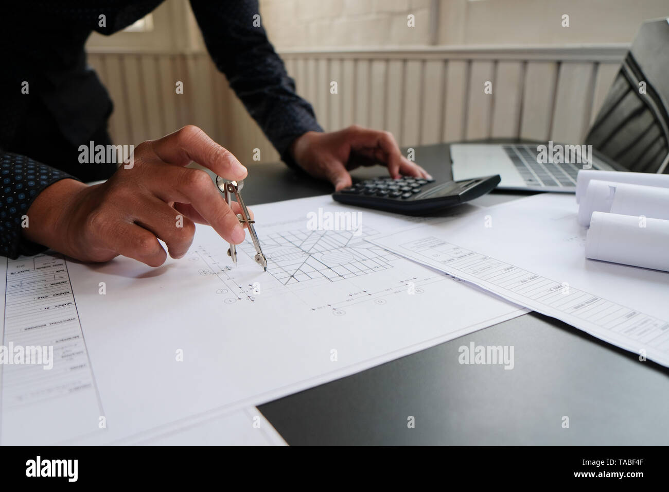 architect engineer working on house blueprint of real estate project at ...