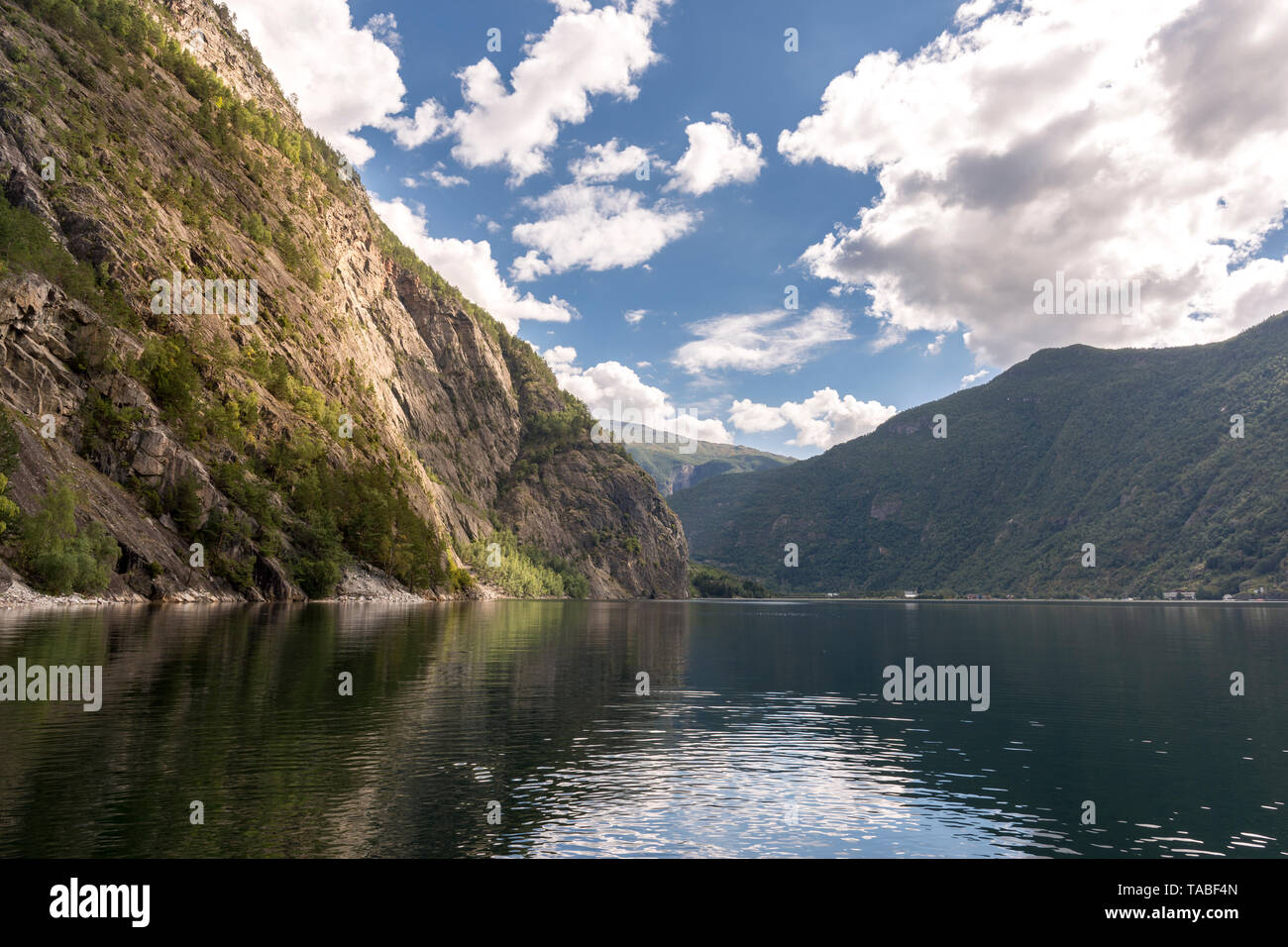 by boat between mountains on the Sognefjord in Laerdal, Norway Stock ...